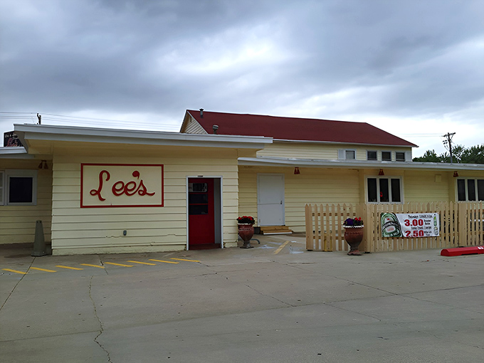 A classic yellow exterior invites you to enjoy a meal at Lee's, where friendly service and tradition await your arrival.