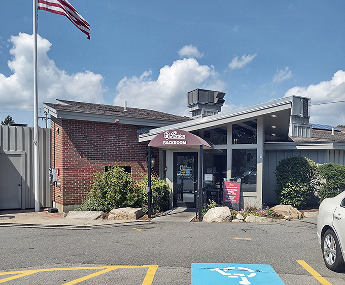 The unassuming entrance to the Puritan Backroom belies the culinary treasures within. Like finding a secret door to comfort food paradise.