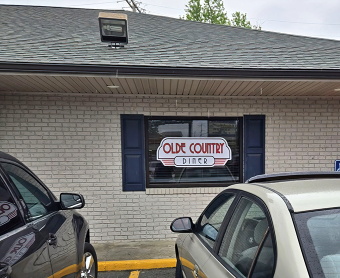The unassuming brick exterior of Olde Country Diner proves once again that culinary treasures often hide behind the most modest facades.