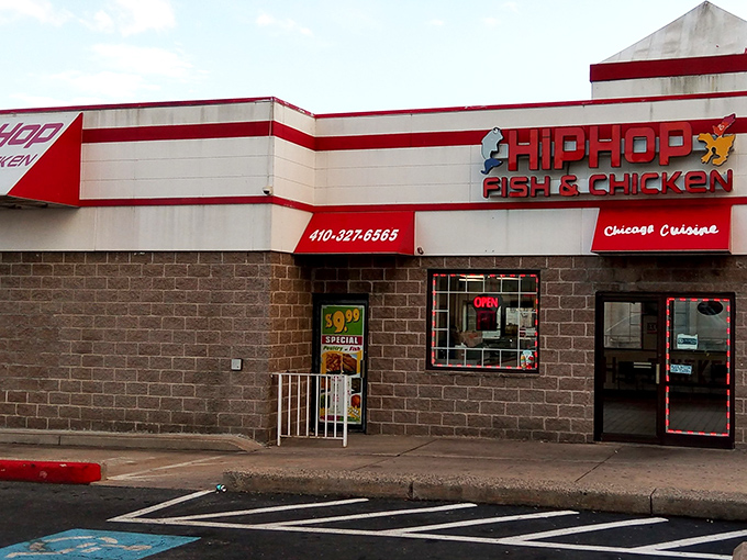 The red and white exterior of Hip Hop Fish & Chicken stands out like a beacon of fried goodness on Baltimore's landscape. Culinary treasures await inside!