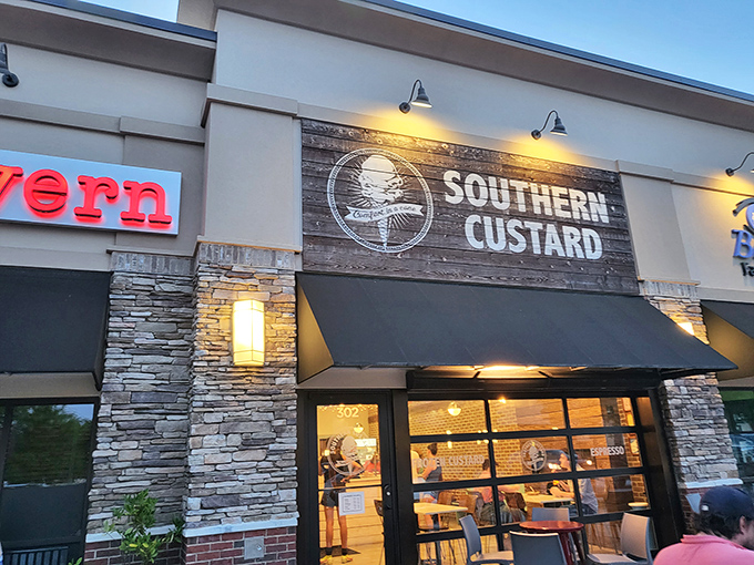 Southern Custard's storefront beckons with its sleek black awning and stone accents. The crowd outside tells you everything you need to know&mdash;this place is worth the wait.