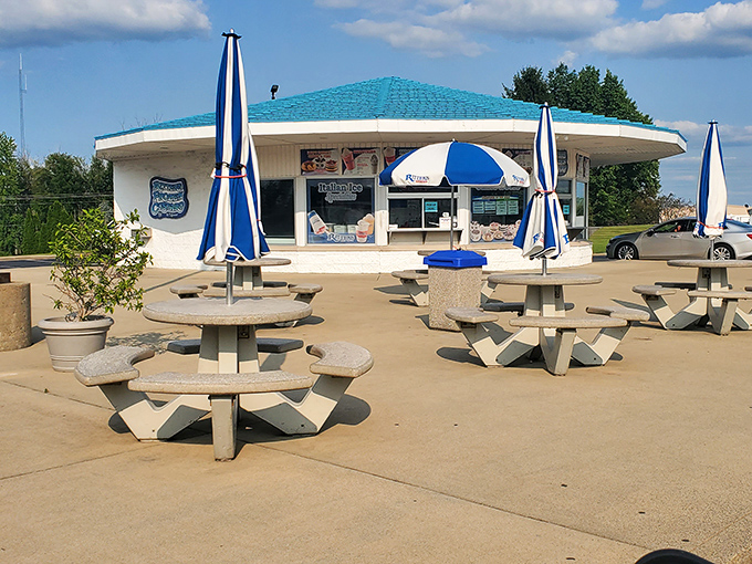 The iconic blue-and-white facade of Ritter's beckons like a frozen oasis in the Indiana summer. Resistance is futile.