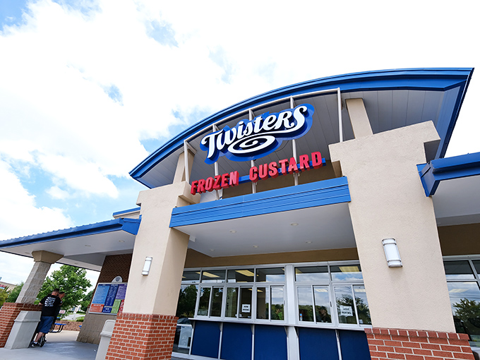 Twisters stands like a beacon of dairy delight with its distinctive curved blue roof, practically whispering sweet promises to passersby.