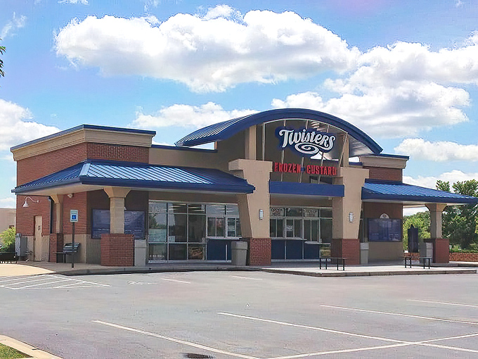 Twisters stands like a beacon of dairy delight with its distinctive curved blue roof, practically whispering sweet promises to passersby.
