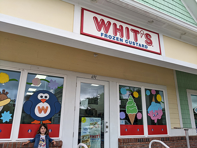 The mint-green beach cottage with its cheerful "WHIT'S FROZEN CUSTARD" sign promises sweet relief from the Carolina heat. Vacation mode: activated.