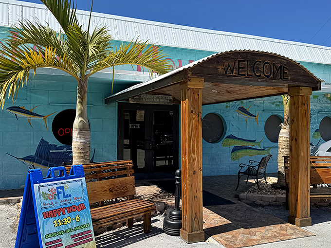 The vibrant turquoise exterior isn't just eye-catching—it's practically shouting "seafood paradise ahead!" through its nautical porthole windows.