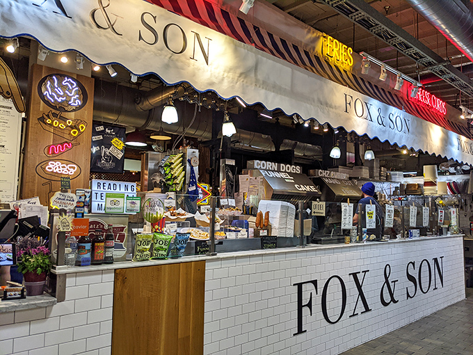 The iconic red and white awning of Fox & Son beckons like a carnival midway for your taste buds. Step right up to corn dog nirvana!