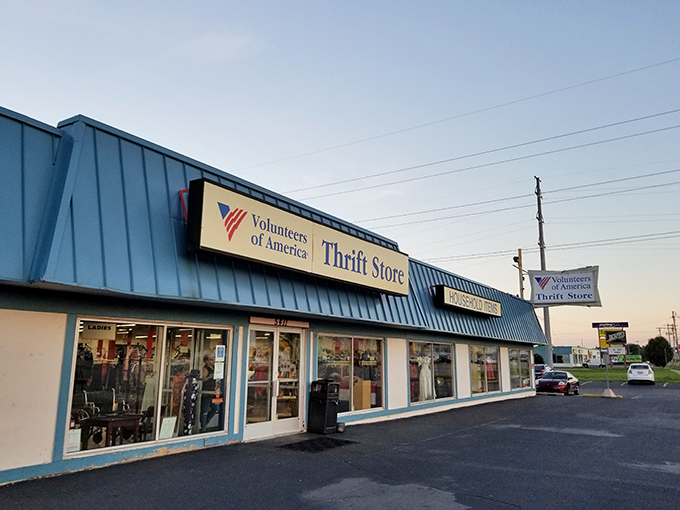 The blue-roofed bargain kingdom beckons with promises of "Brand Clothing" and treasures waiting to be discovered inside.
