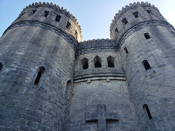 Those twin towers reach skyward like medieval sentinels keeping watch over St. Augustine's coastline, their weathered stone telling stories of another time and place.