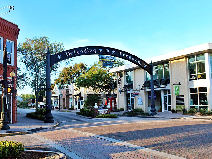 Palm-lined streets create nature's colonnade in downtown Dunedin, where walking paths invite leisurely strolls rather than hurried commutes. 