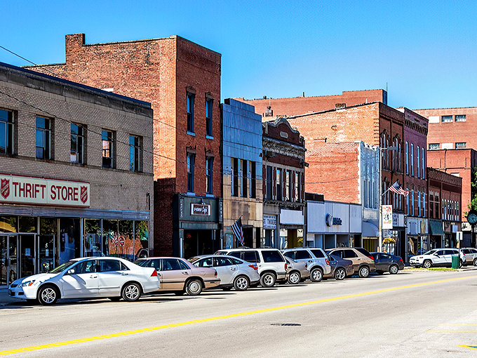 Downtown Ashtabula glows with golden-hour charm, its historic brick buildings standing as testaments to a simpler time when Main Streets were the heart of America.