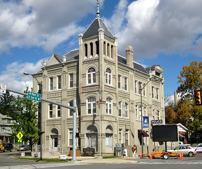 The historic Bloomsburg Town Hall stands like a limestone sentinel, watching over generations of small-town stories with dignified grace.