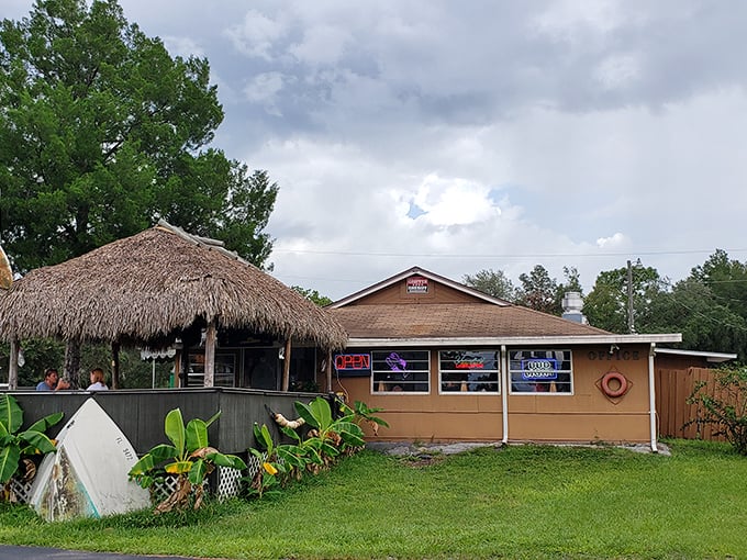 The unassuming exterior of Dan's Clam Stand proves once again that in Florida, the most magical seafood experiences often hide behind the simplest facades.