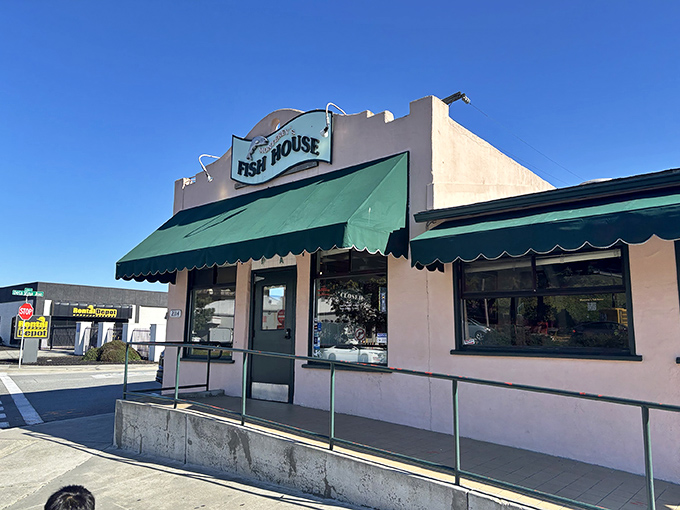 The unassuming exterior of Monterey's Fish House glows with promise at dusk, like a lighthouse beckoning hungry sailors home.