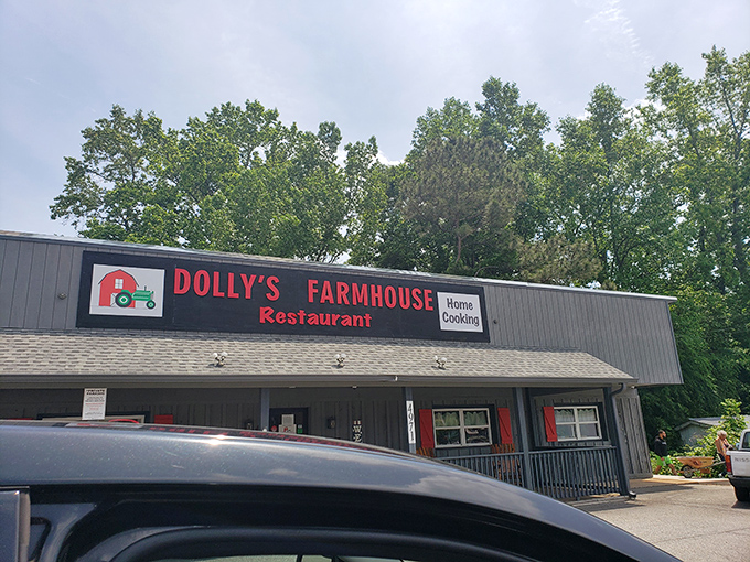 The rustic wooden exterior of Dolly's Farmhouse Restaurant promises authenticity before you even step inside. That American flag isn't just decoration&mdash;it's a guarantee.