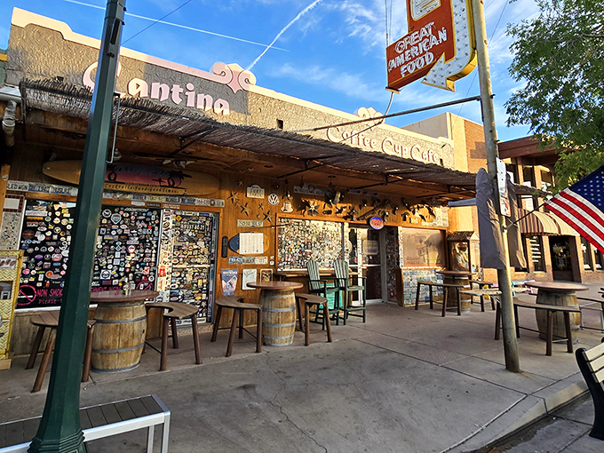 Sticker heaven meets breakfast paradise. The Coffee Cup Cafe's exterior is a visual feast of memorabilia that promises the culinary adventure waiting inside. 