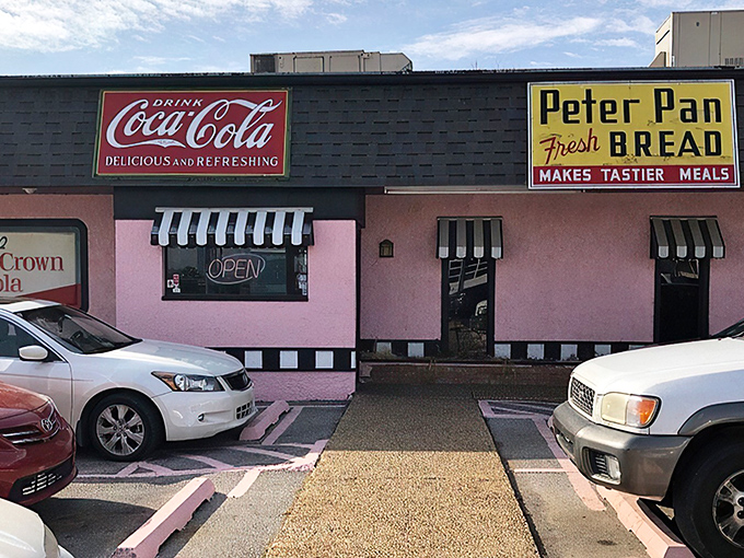 The classic diner interior at Sherri's transports you to a simpler time when vinyl booths and neon lights were the height of dining sophistication. 