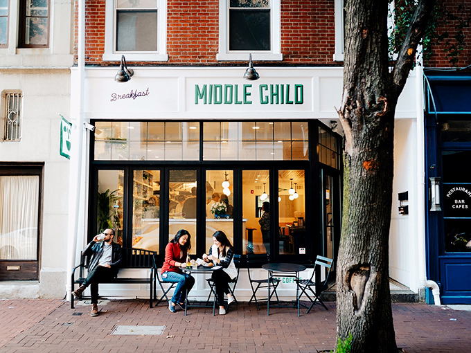 Middle Child's charming storefront invites you in with its clean white facade and green accents. The sidewalk seating practically begs you to linger over breakfast.