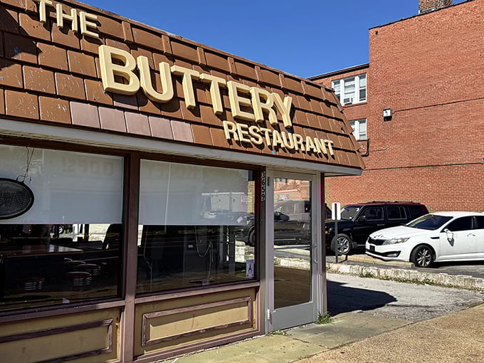 The unassuming brown exterior of The Buttery Restaurant stands as a beacon to breakfast aficionados who know that culinary treasures often hide in plain sight.