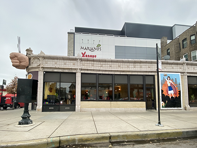 The iconic fist clutching silverware announces your arrival at hash brown heaven. Stella's Diner stands proud on Chicago's North Side, beckoning hungry souls with its unmistakable sign.