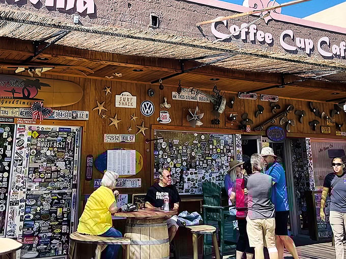 Sticker heaven meets breakfast paradise. The Coffee Cup Cafe's exterior is a visual feast of memorabilia that promises the culinary adventure waiting inside.