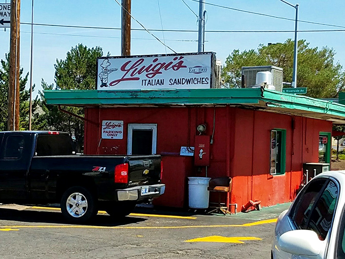 The iconic red and green exterior of Luigi's screams "authentic Italian joint" with all the subtlety of an enthusiastic nonna inviting you to mangia!