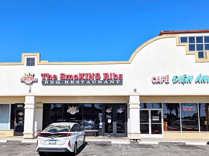 The bright red signage against the white stucco is like a barbecue beacon calling to hungry souls. No fancy frills needed when the food does the talking.