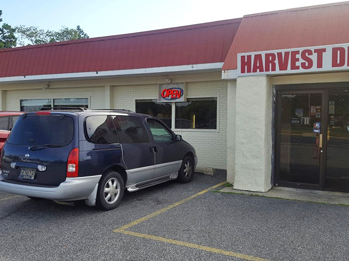 The humble exterior with its distinctive red roof belies the culinary treasures within. Some of life's greatest pleasures hide behind the simplest facades.