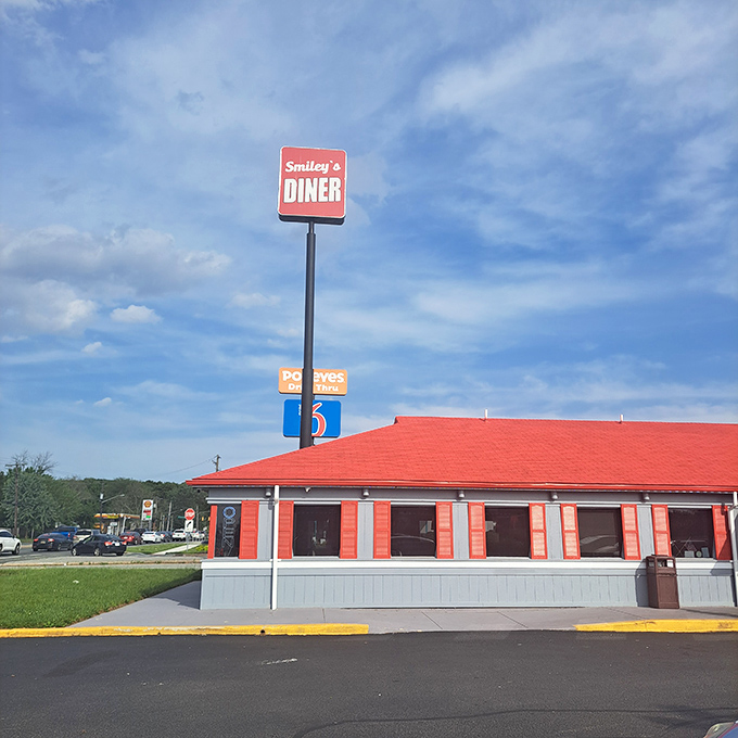 The iconic red roof of Smiley's stands out like a breakfast beacon, promising comfort food salvation even on the gloomiest Delaware morning.