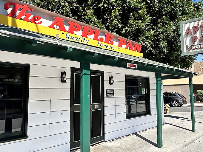The unassuming white building with its vintage sign promises "Quality Forever" &ndash; a bold claim that The Apple Pan has somehow managed to keep for decades.