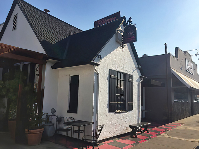 That charming red door isn't just an entrance &ndash; it's your gateway to cinnamon roll paradise in Petaluma. 