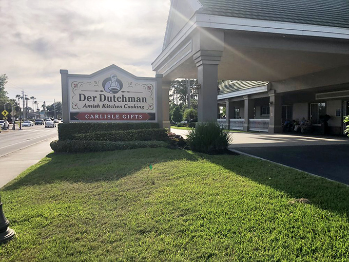 The welcoming sign of Der Dutchman stands like a beacon of butter-based hope amid Florida's palm trees. Amish paradise found!