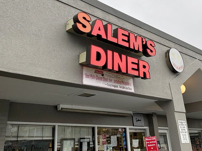 The bright red "SALEM'S DINER" sign beckons hungry travelers like a lighthouse for the breakfast-starved. This unassuming storefront houses culinary treasures worth the journey.