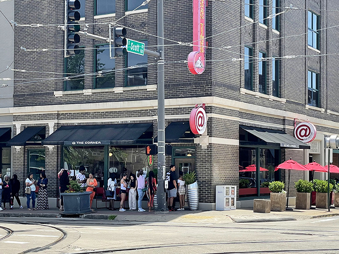 The line outside At The Corner tells you everything you need to know&mdash;this place is worth the wait. Those red umbrellas aren't just for show; they're beacons of breakfast bliss.