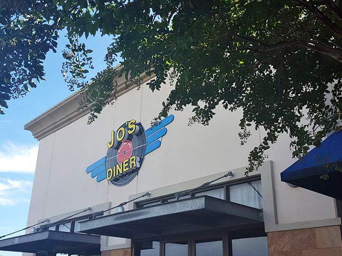The unassuming exterior of Jo's Diner in Flowood hides a breakfast paradise within. That blue and white sign promises comfort food glory that delivers every time.