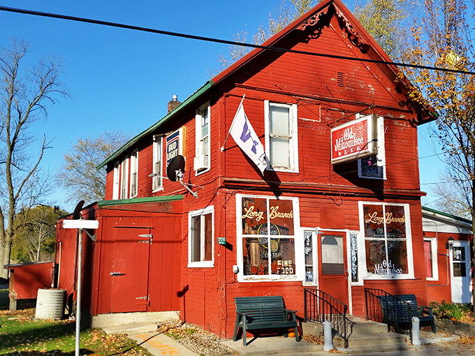 The weathered red exterior with its green roof isn't trying to impress anyone&mdash;it's saving all that energy for what's happening in the kitchen. 