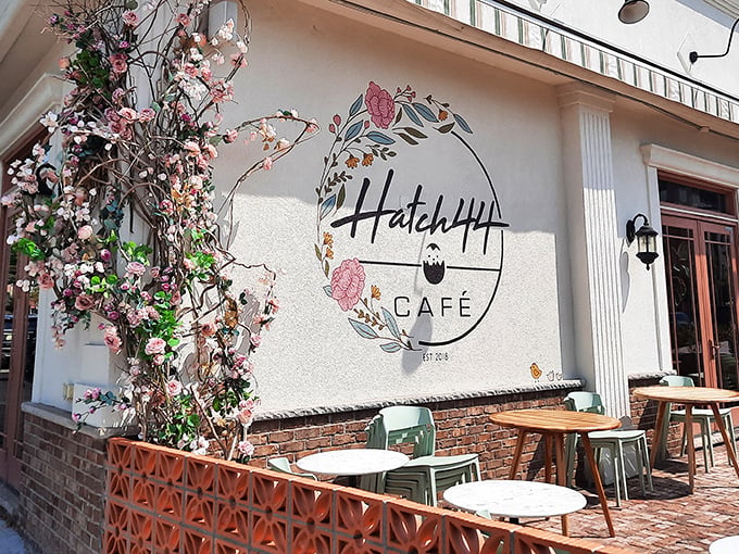 Hatch44's pristine white exterior with striped awnings isn't just inviting&mdash;it's practically winking at you to come inside for breakfast magic.