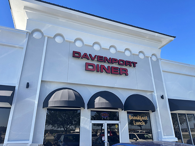 The unassuming white facade of Davenport Diner might fool you, but locals know this modest exterior hides culinary treasures worth discovering.