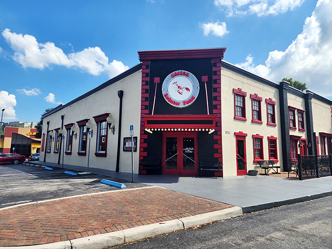 The iconic red lobster sign serves as a siren call to seafood lovers, promising a New England feast in the heart of sunny Orlando.