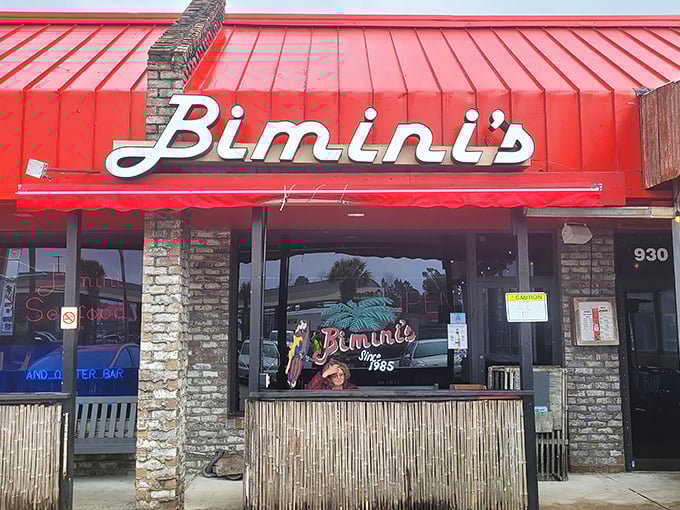 The iconic red roof and awning of Bimini's stands as a beacon for seafood lovers. No fancy frills needed when the food speaks this loudly.The iconic red roof and awning of Bimini's stands as a beacon for seafood lovers. No fancy frills needed when the food speaks this loudly.