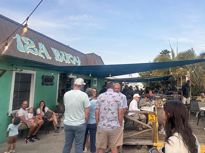 The turquoise exterior of 12A Buoy might not scream "culinary destination," but as any Florida treasure hunter knows, the most unassuming spots often hide the greatest rewards.