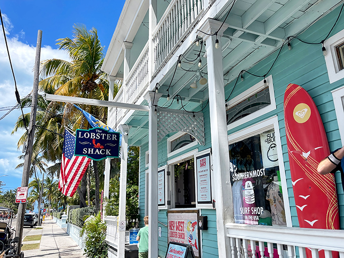 A slice of New England painted turquoise and planted in paradise. The Lobster Shack's cheerful exterior promises seafood salvation just steps from Duval Street.