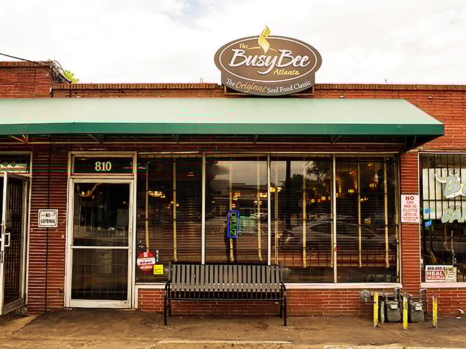 The unassuming brick exterior with its vintage yellow sign has been Atlanta's beacon of fried chicken excellence since 1947. Those yellow bollards might as well be velvet ropes.