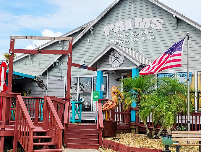 Old Florida charm at its finest! The seafoam green exterior and red stairs of Palms Fish Camp welcome you to a waterfront dining experience worth the drive.