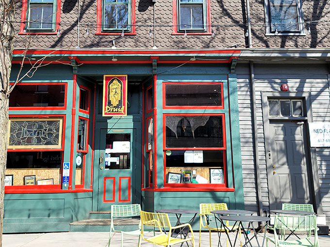 The emerald facade with cherry-red trim isn't just eye-catching&mdash;it's a promise that inside this unassuming Cambridge corner, culinary magic awaits.