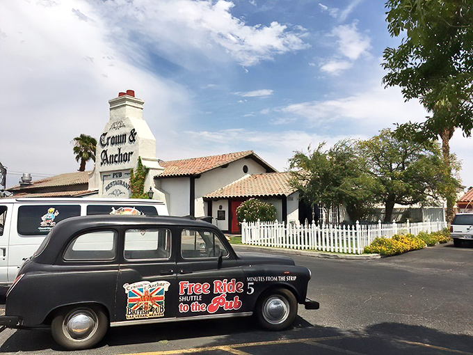 A slice of England in the desert! The Crown & Anchor's white-washed exterior and iconic London taxi promise authentic British charm just minutes from the Strip.