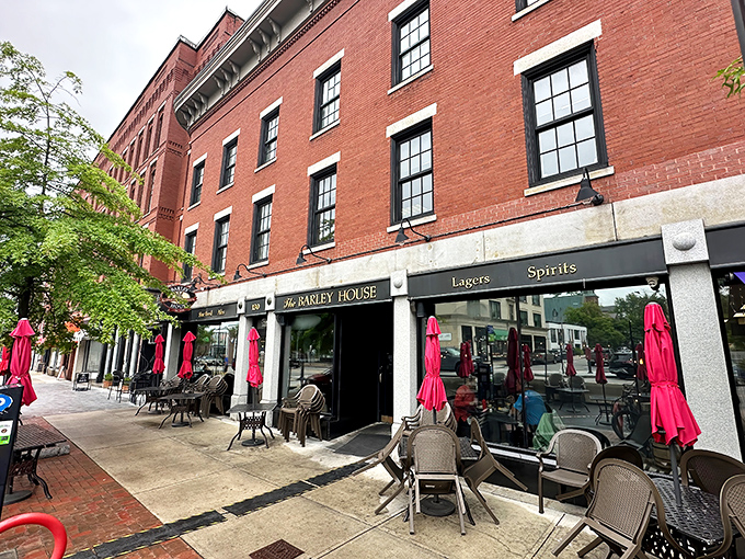 The classic red brick fa&ccedil;ade of The Barley House beckons like an old friend, with cheerful red umbrellas promising good times on the patio.