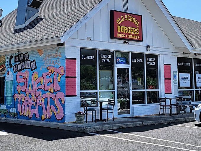 The white building with vibrant mural screams "comfort food lives here!" Old School Burgers stands proud in Willow Grove, promising nostalgic flavors without pretension.