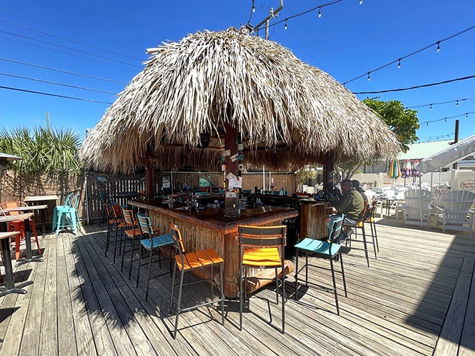 The quintessential tiki experience awaits under this meticulously crafted palm-thatched roof. Paradise isn't a place&mdash;it's this bar stool with an ocean breeze.