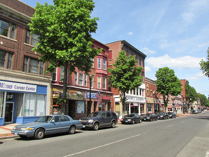 Downtown Meriden showcases its historic architecture against a bright blue sky, where affordability meets New England charm.